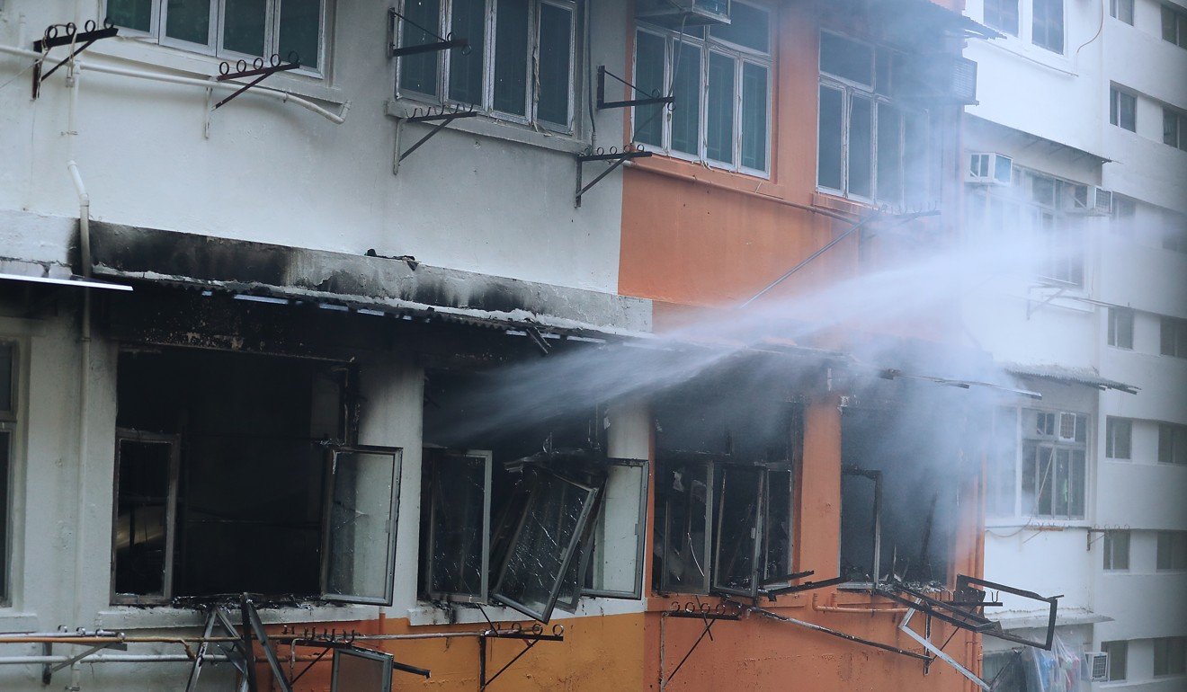 Fire hits Hong Kong residential block, injuring two as 130 others ...