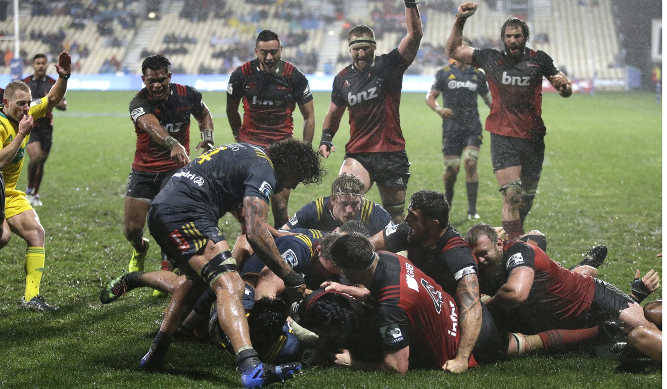 Crusaders stand tall in shocking conditions to reach Super Rugby semi ...