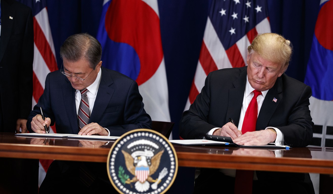 Donald Trump and Moon Jae-in sign renegotiated trade agreement | South ...