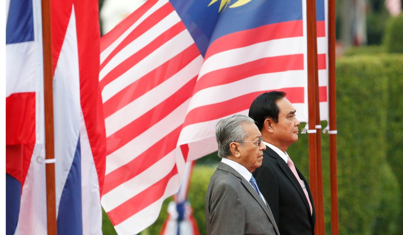 Malaysian PM Mahathir Mohamad and Thai PM Prayuth Chan-ocha discuss ...