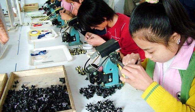 China's village children lured out of school to work underage in city ...