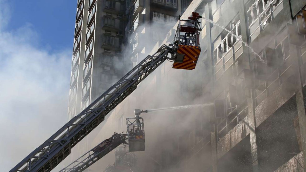 Nervous Hong Kong landlords move on fire safety following killer fire ...