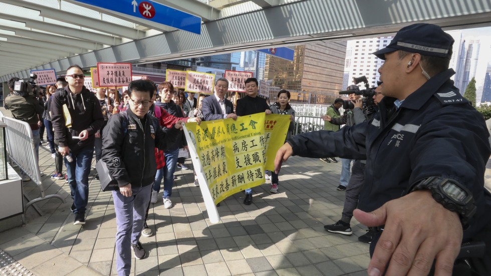 Hong Kong hospital support staff protest against labour shortages in ...